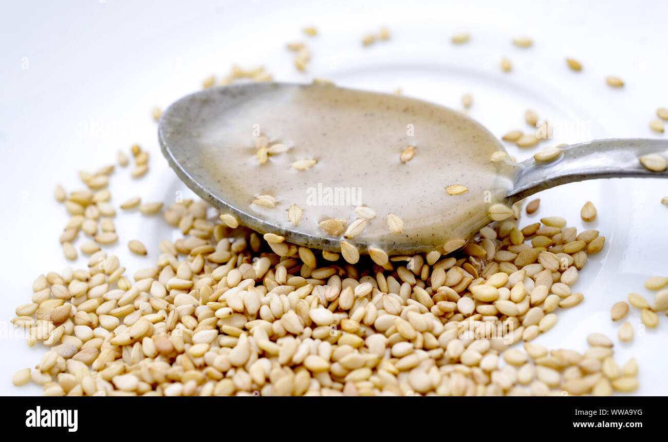 sesame seeds and tahini syrup, image Stock Photo - Alamy