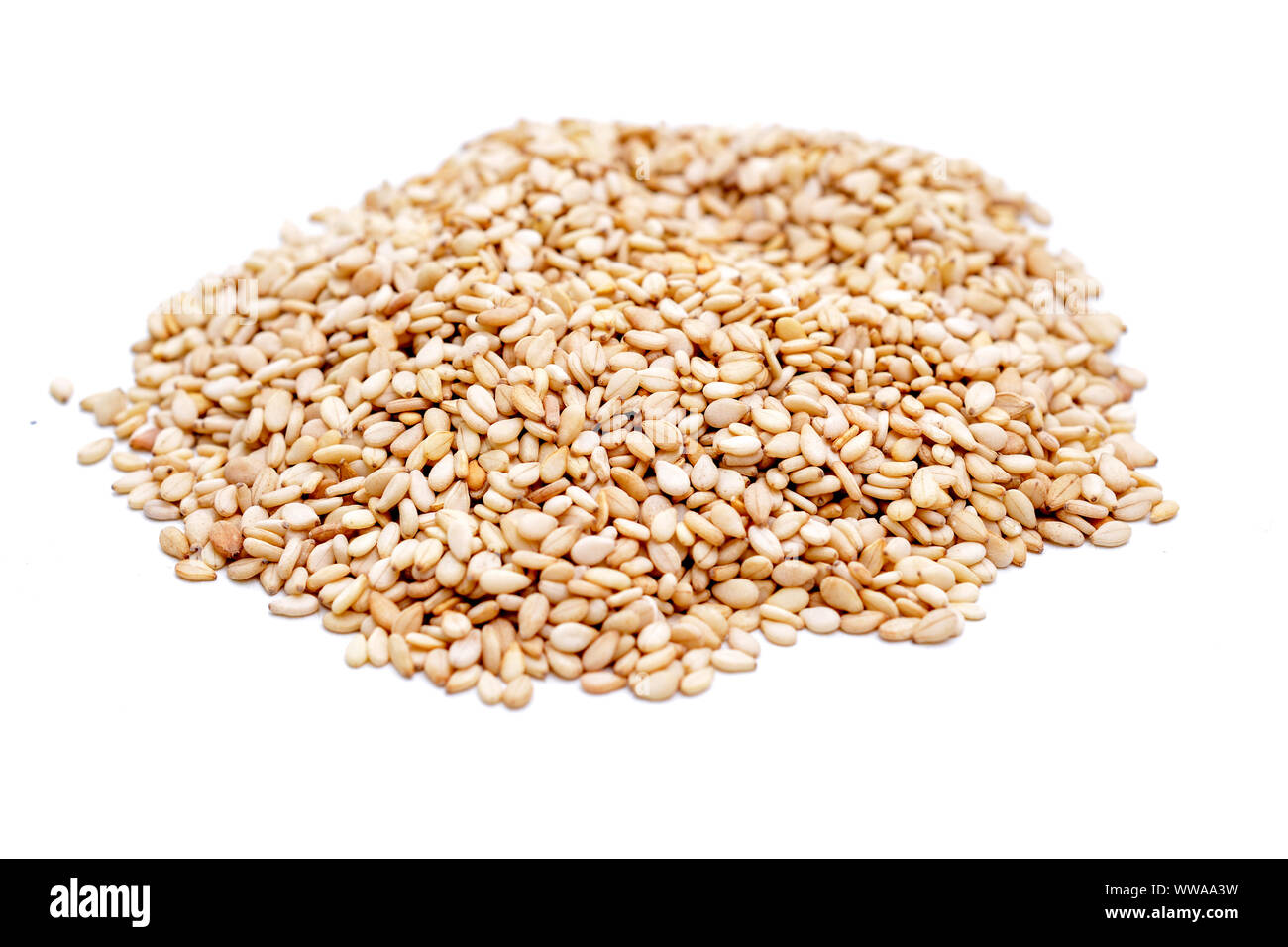 tahini seeds on white background, image of a Stock Photo - Alamy
