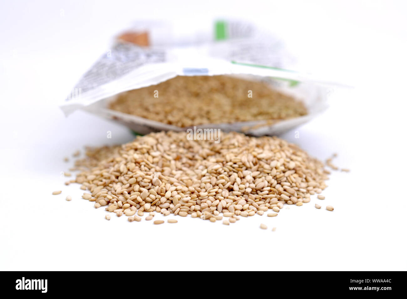 tahini seeds on white background, image of a Stock Photo - Alamy