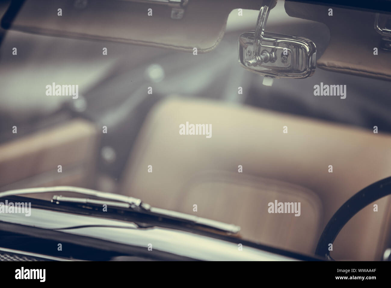 Color close up horizontal shot of the rear view mirror of a vintage car ...