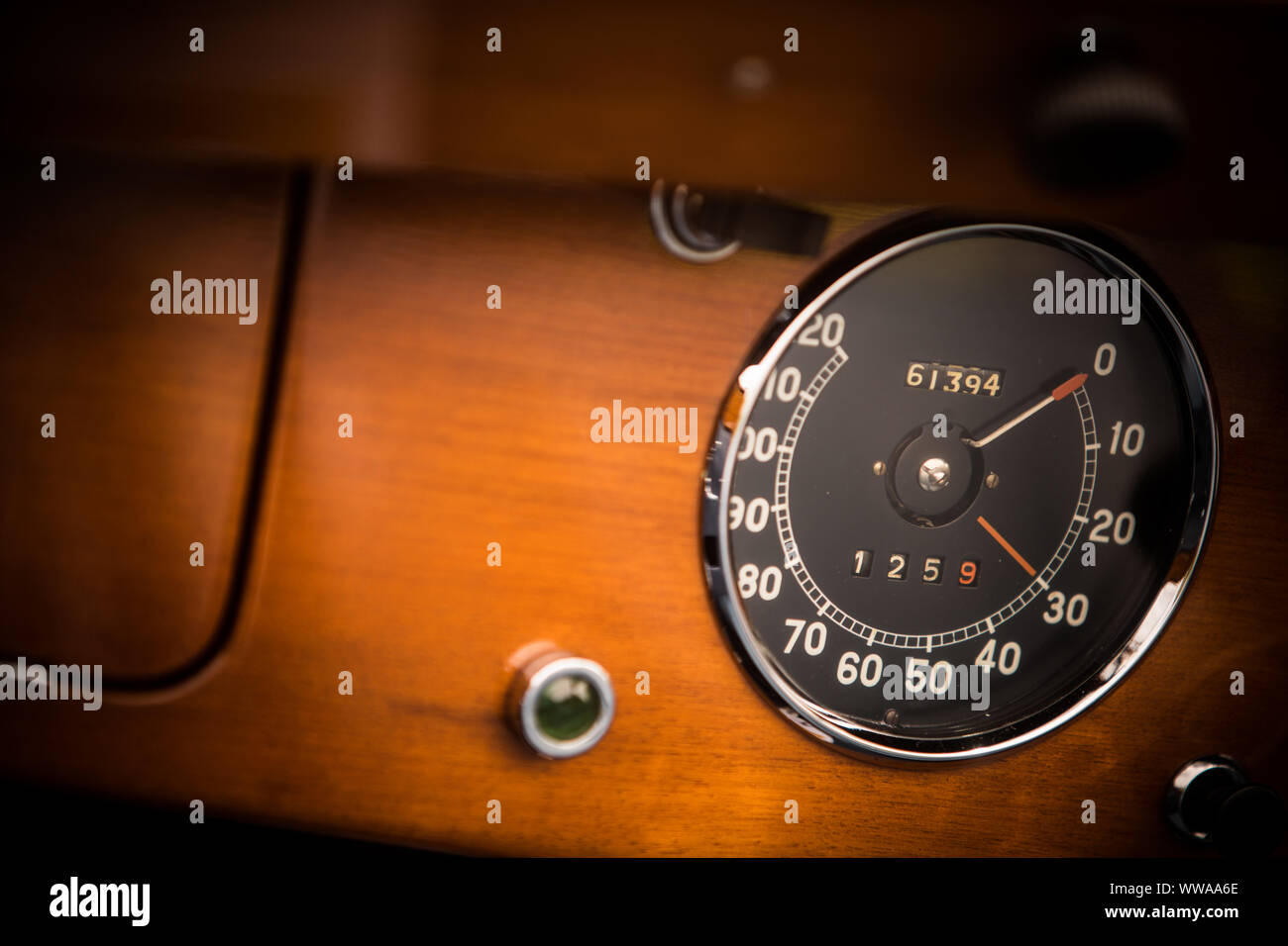 Color close up shot of a blue speedometer on a vintage car's dashboard ...