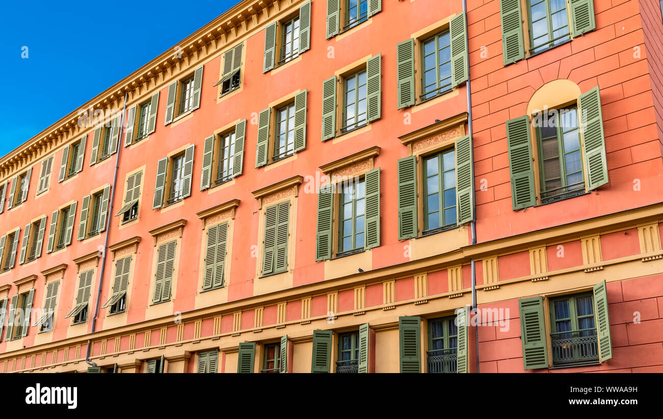 Nice, France, colorful facades, with typical windows and shutters Stock ...
