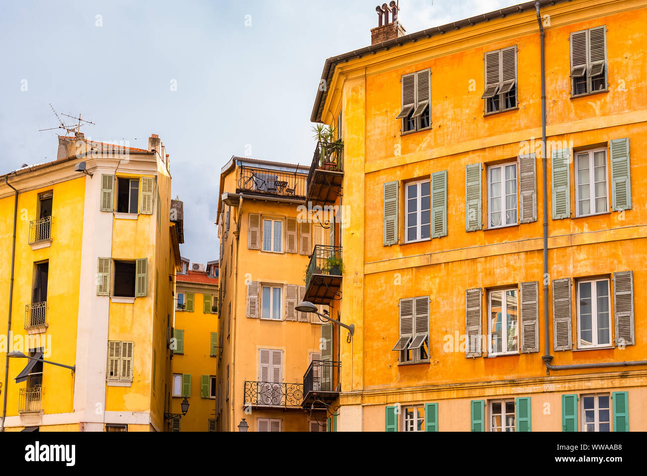 Nice, France, colorful facades, with typical windows and shutters Stock ...
