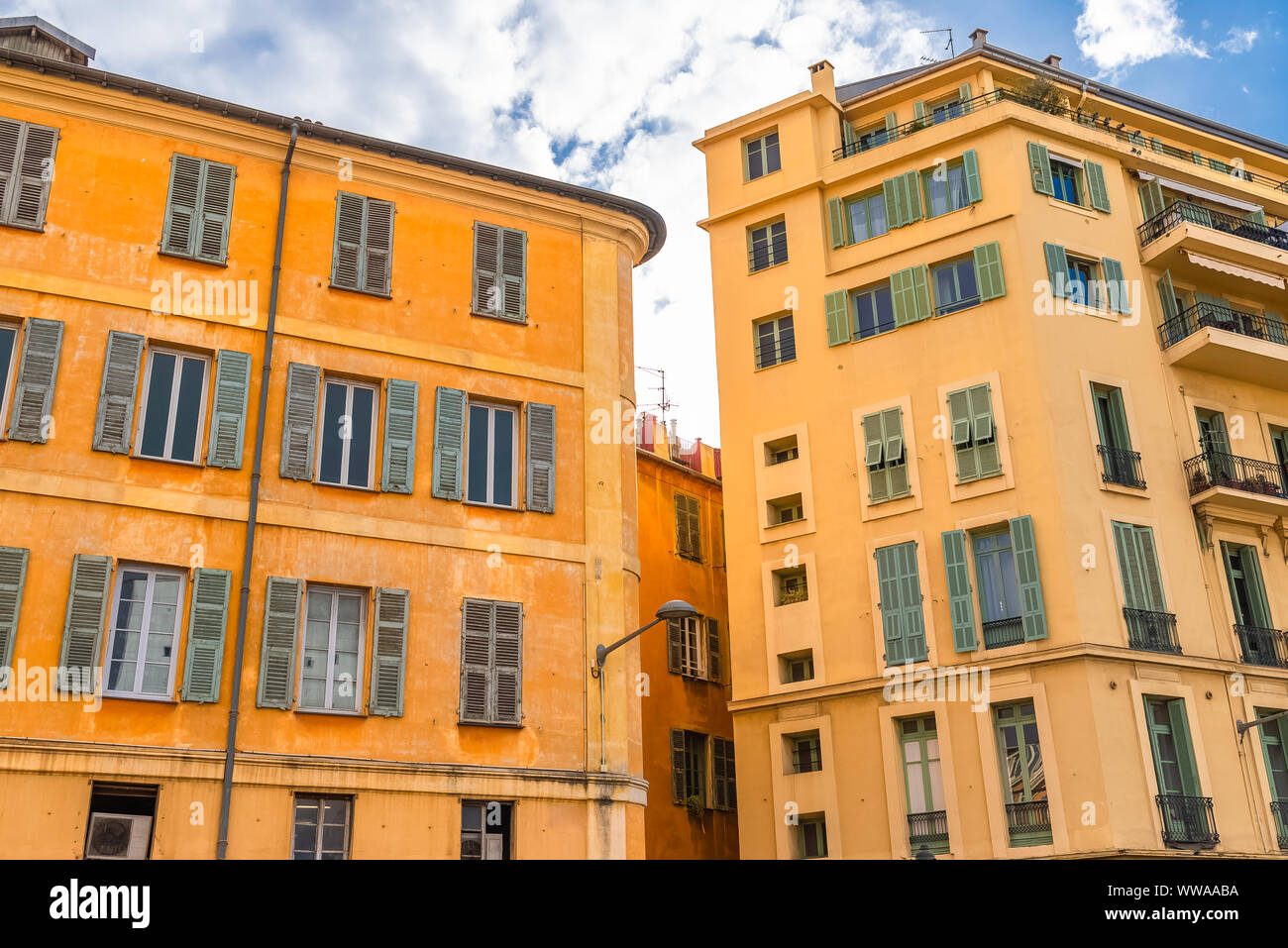 Nice, France, colorful facades, with typical windows and shutters Stock ...