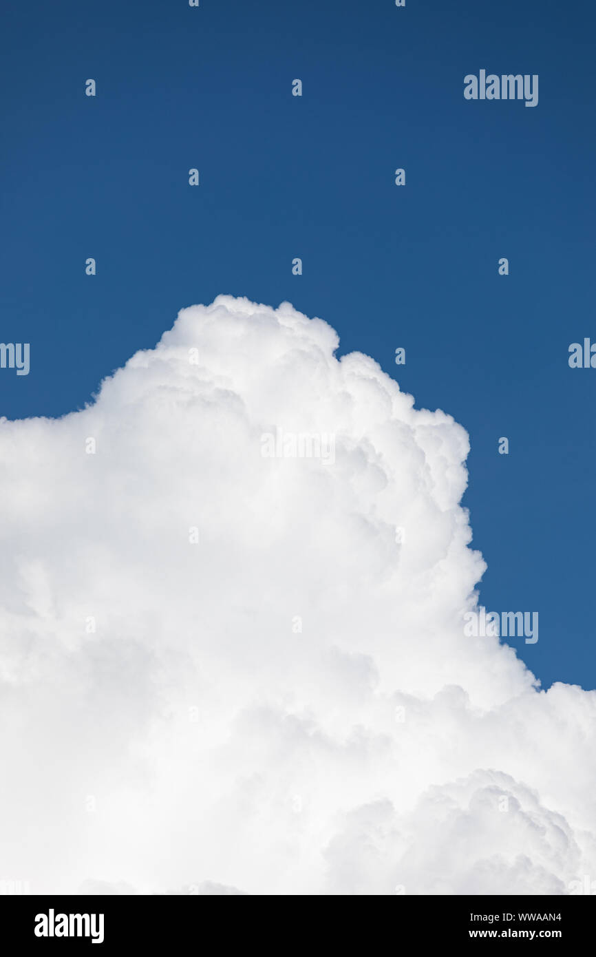 Fluffy cloud edge and blue sky cloudscape background Stock Photo - Alamy
