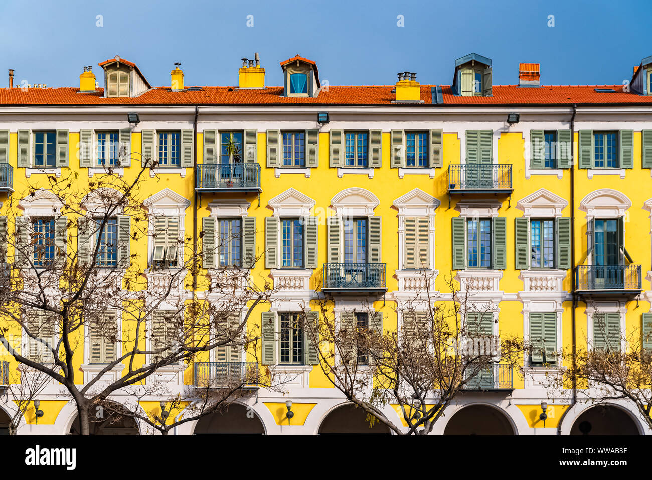 Nice, France, colorful facades, with typical windows and shutters Stock ...