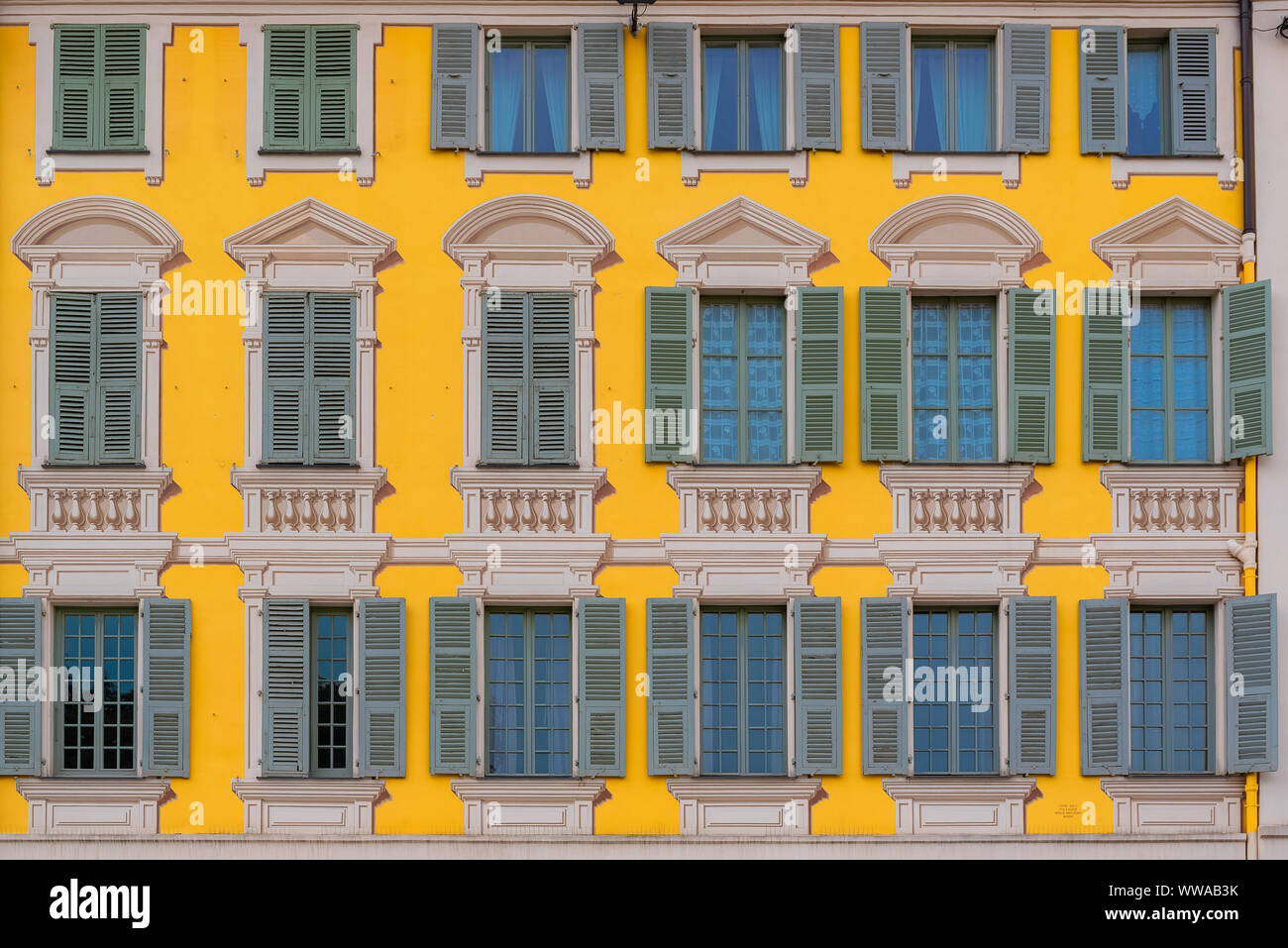 Nice, France, colorful facades, with typical windows and shutters Stock ...