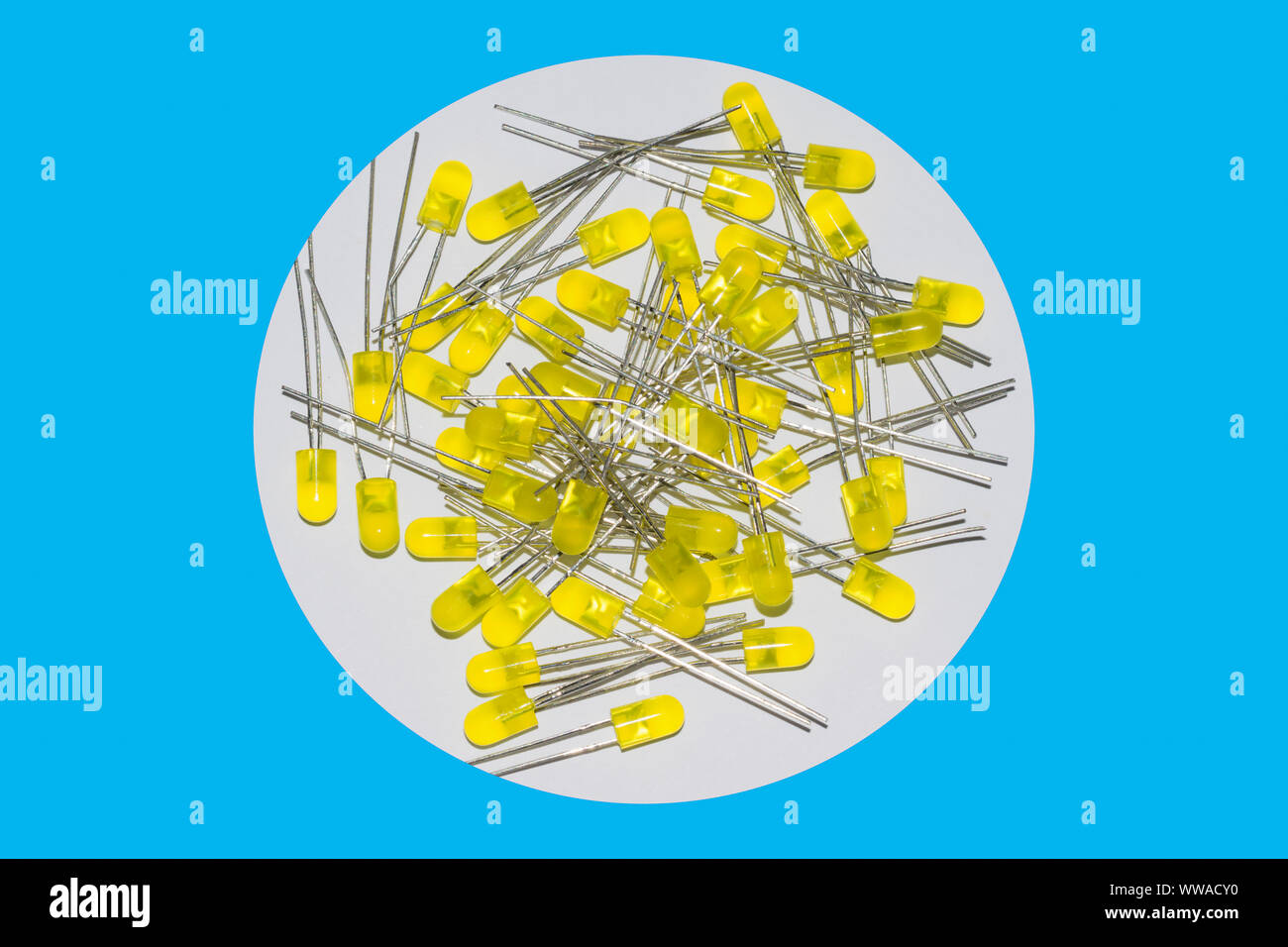 close up image of 5mm yellow leds isolated on white background,pile of ...