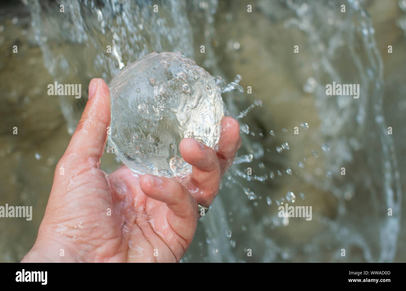 Water hand refraction hi-res stock photography and images - Alamy