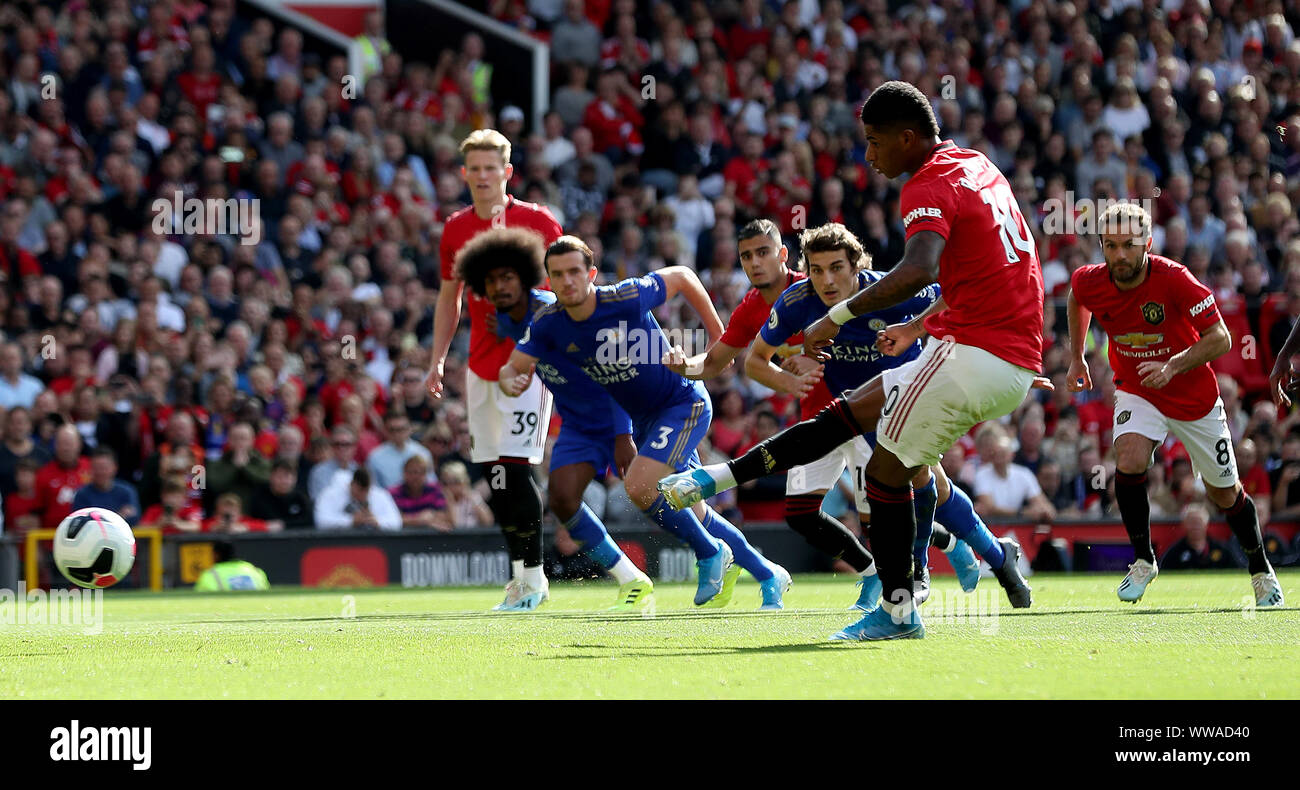 Manchester United's Marcus Rashford scores his side's first goal of the ...