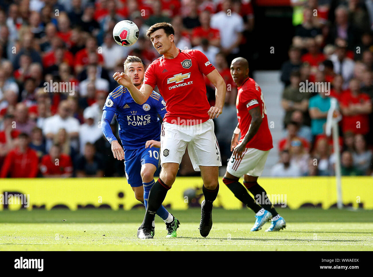 Manchester uniteds harry maguire heads ball hi-res stock photography ...