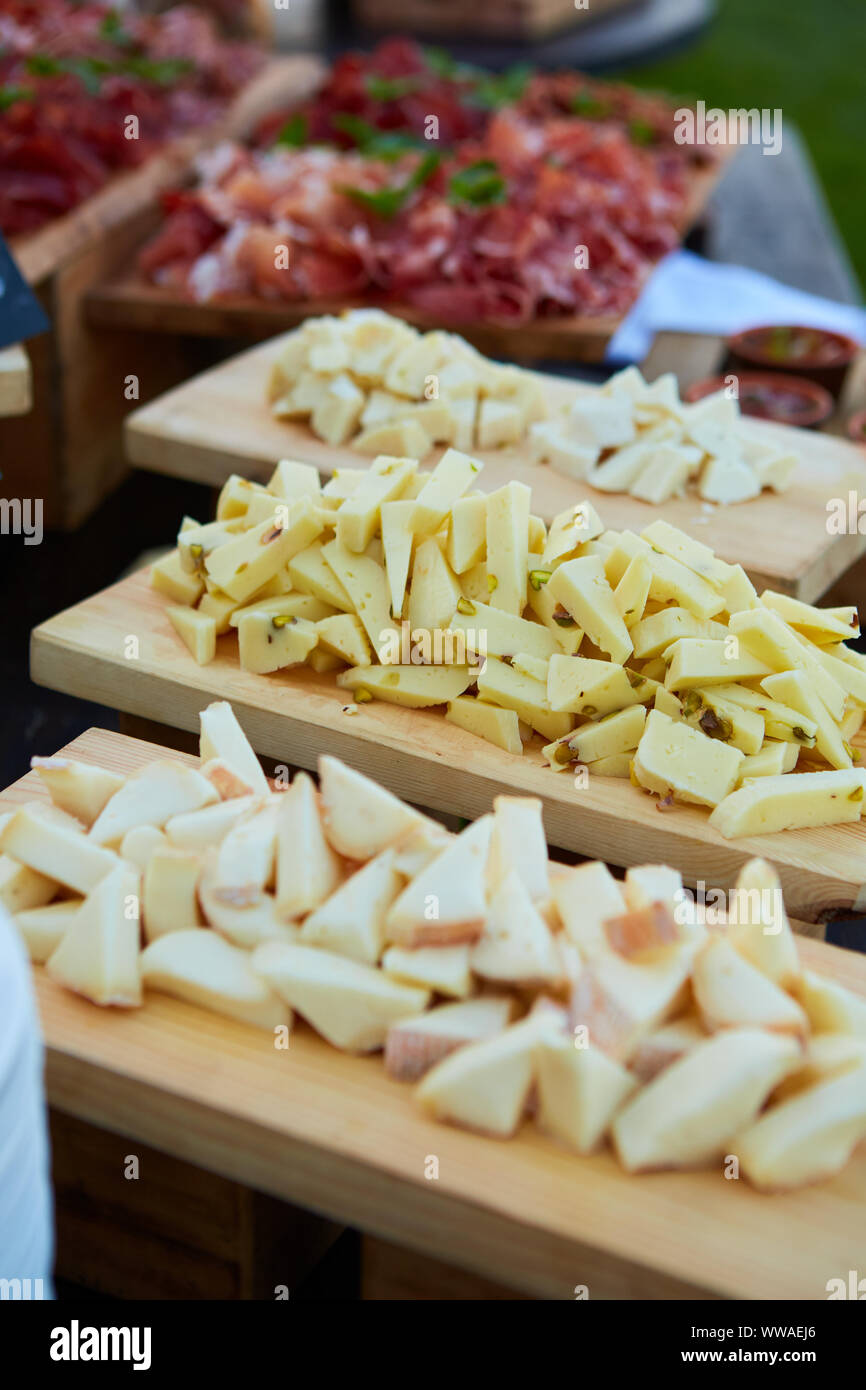 Assorted cheeses in various shapes and sizes Stock Photo - Alamy