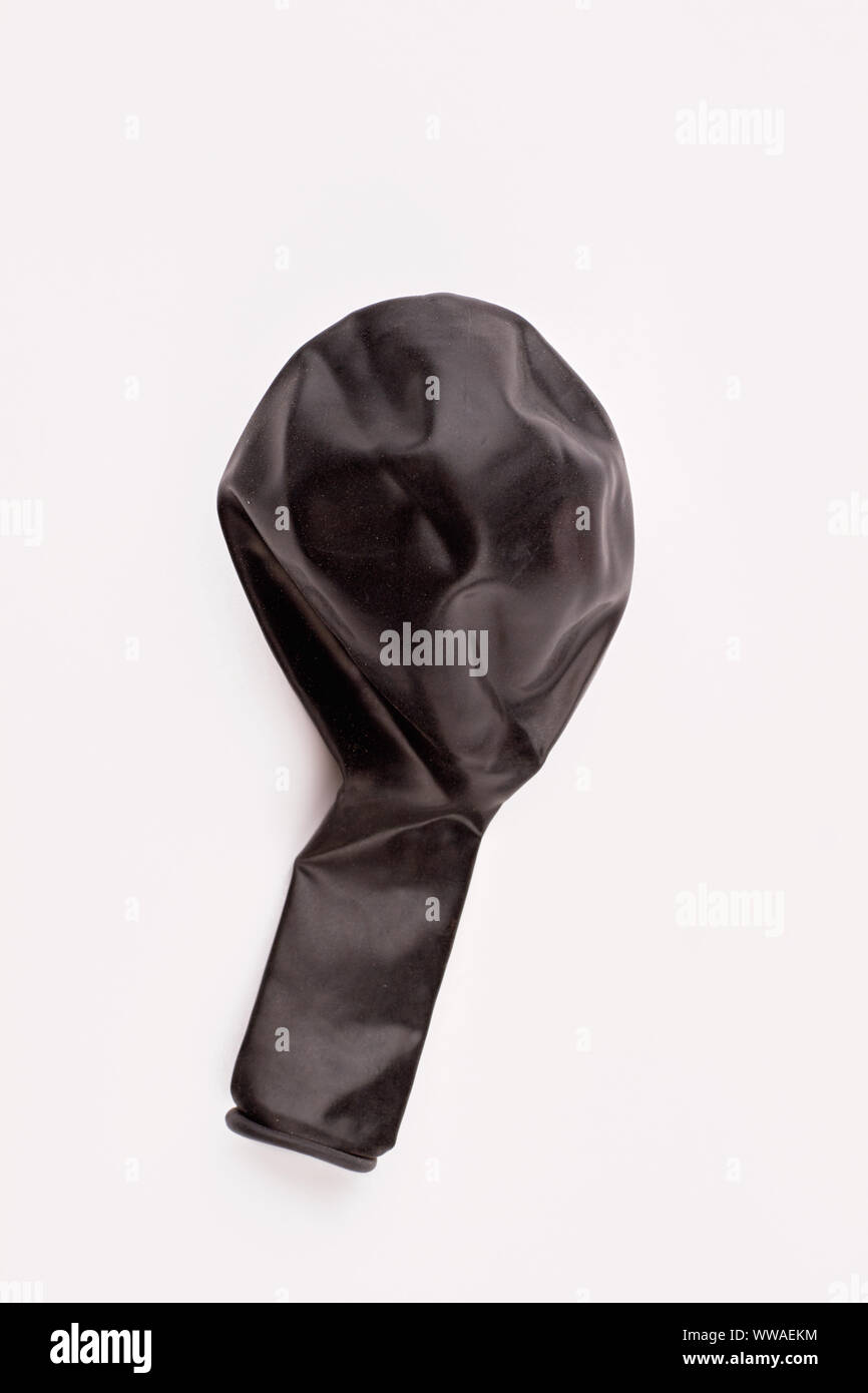 Black balloon without air Stock Photo - Alamy