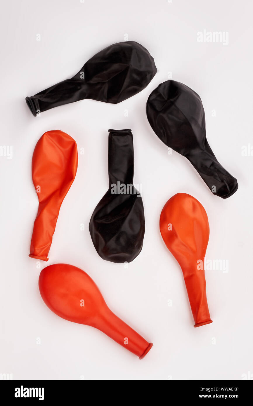 Colorful balloons without air Stock Photo - Alamy