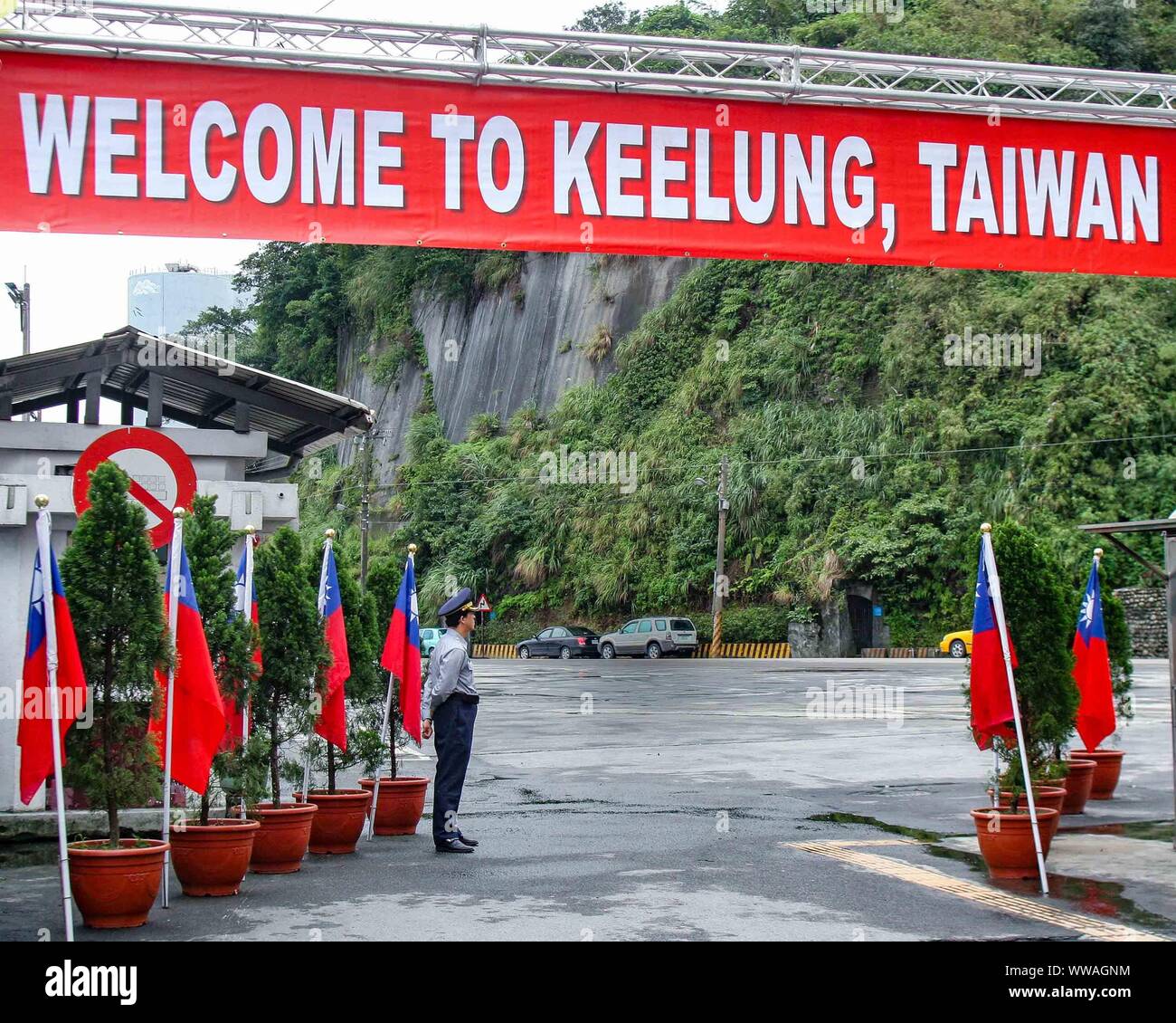 Keelung City, Taiwan. 2nd Nov, 2006. A uniformed security guard stands ...