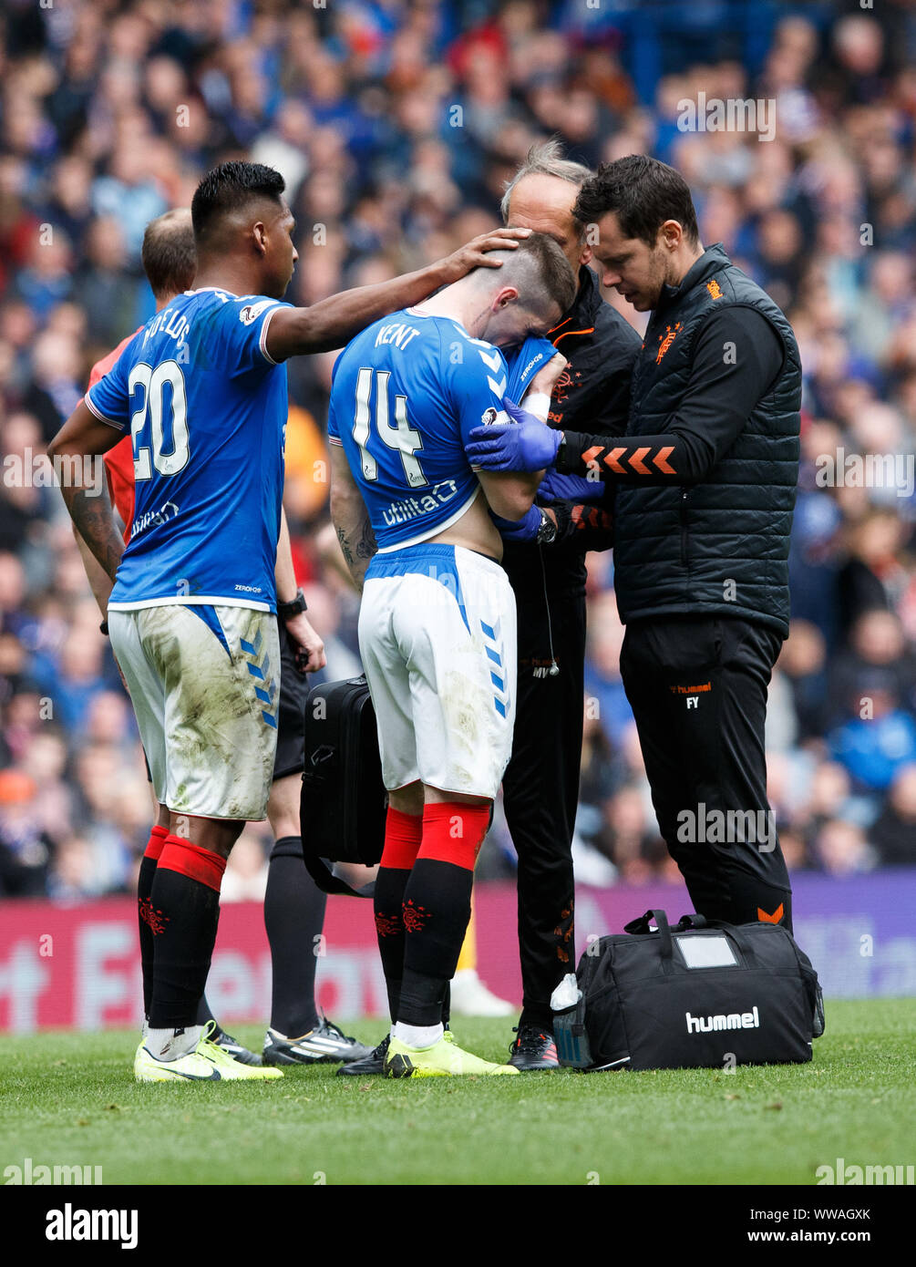 Rangers' Ryan Kent leaves the field injured during the Ladbrokes ...