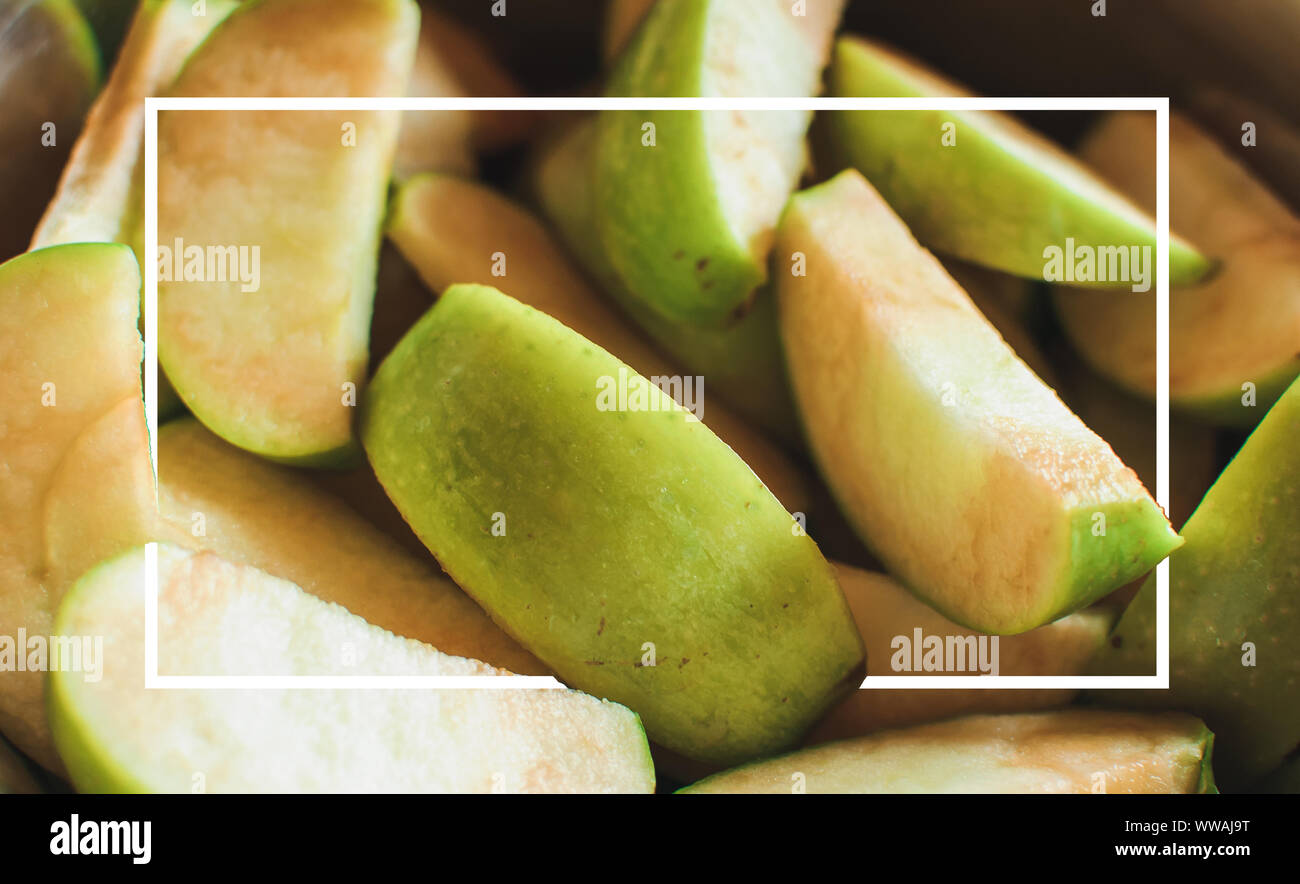 Creative layout of cut green apples and framing a white frame. Layout ...