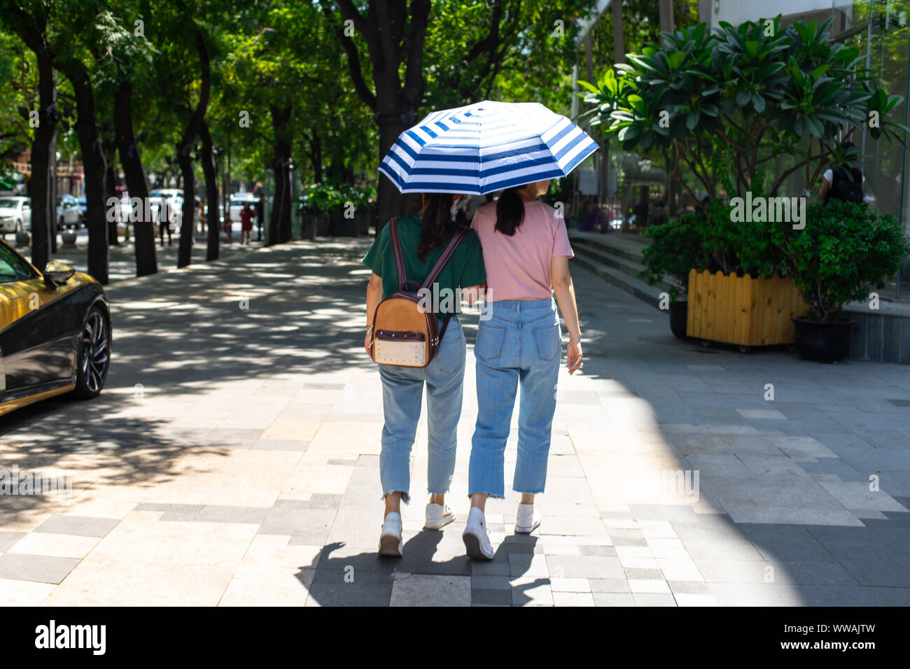 A fashionable area of Beijing where young girls stroll. Chinese girls ...