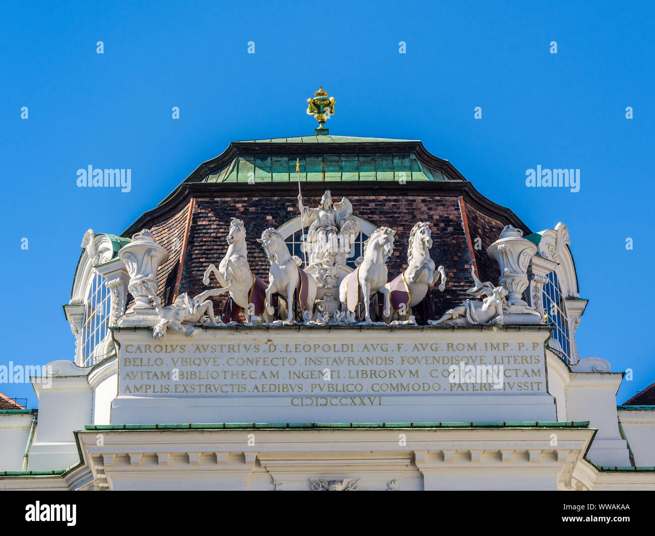 Ornate stone equestrian statuary and details above Josefsplatz, Vienna ...