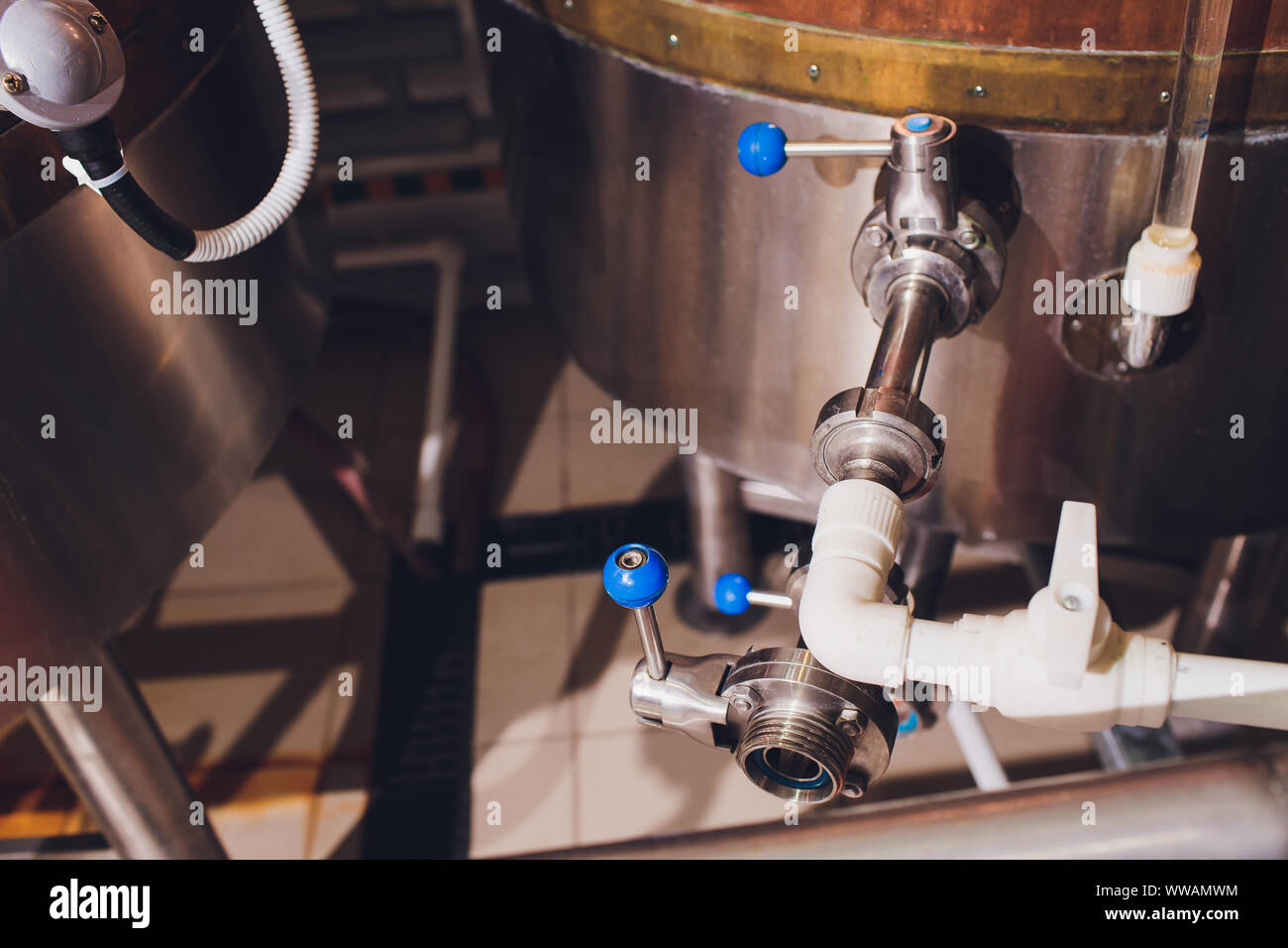 Craft beer brewing equipment in brewery Metal tanks, alcoholic drink ...