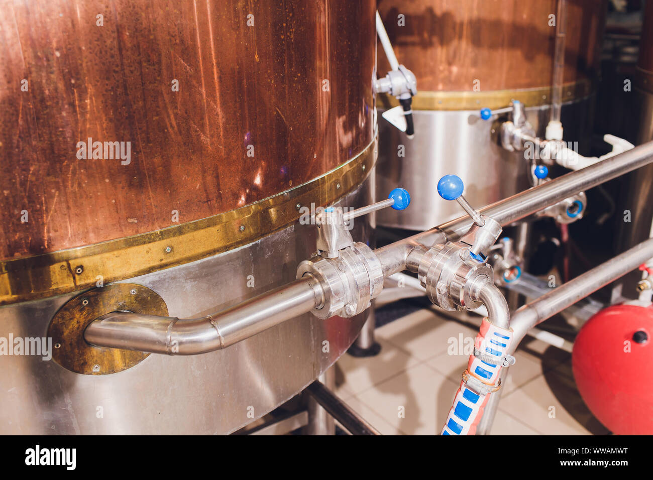 Craft beer brewing equipment in brewery Metal tanks, alcoholic drink ...