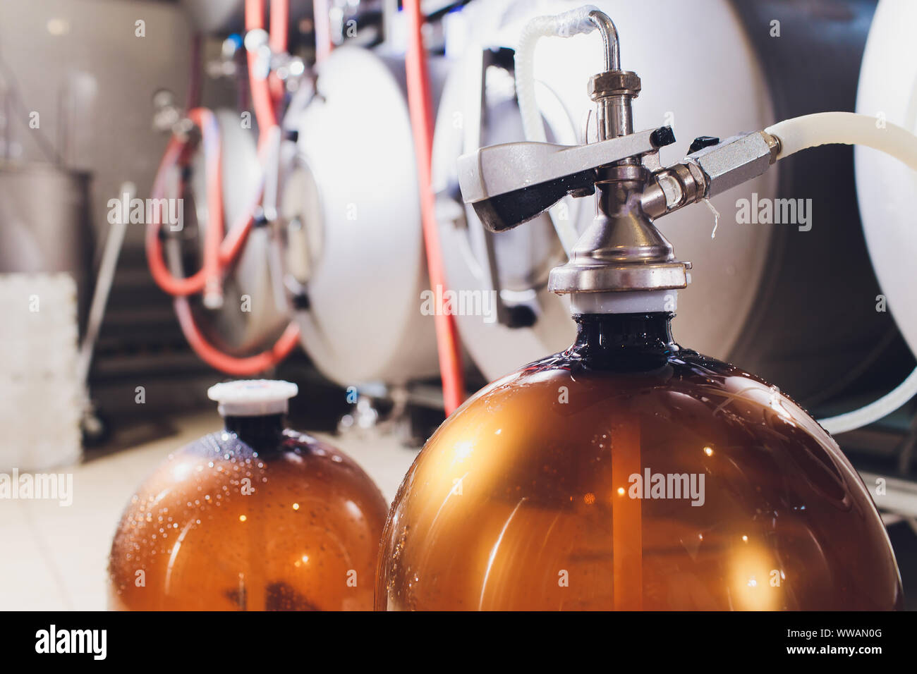 Craft beer brewing equipment in brewery Metal tanks, alcoholic drink ...