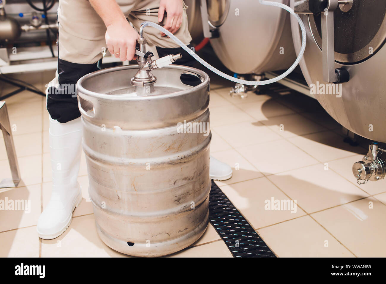 Craft beer brewing equipment in brewery Metal tanks, alcoholic drink ...