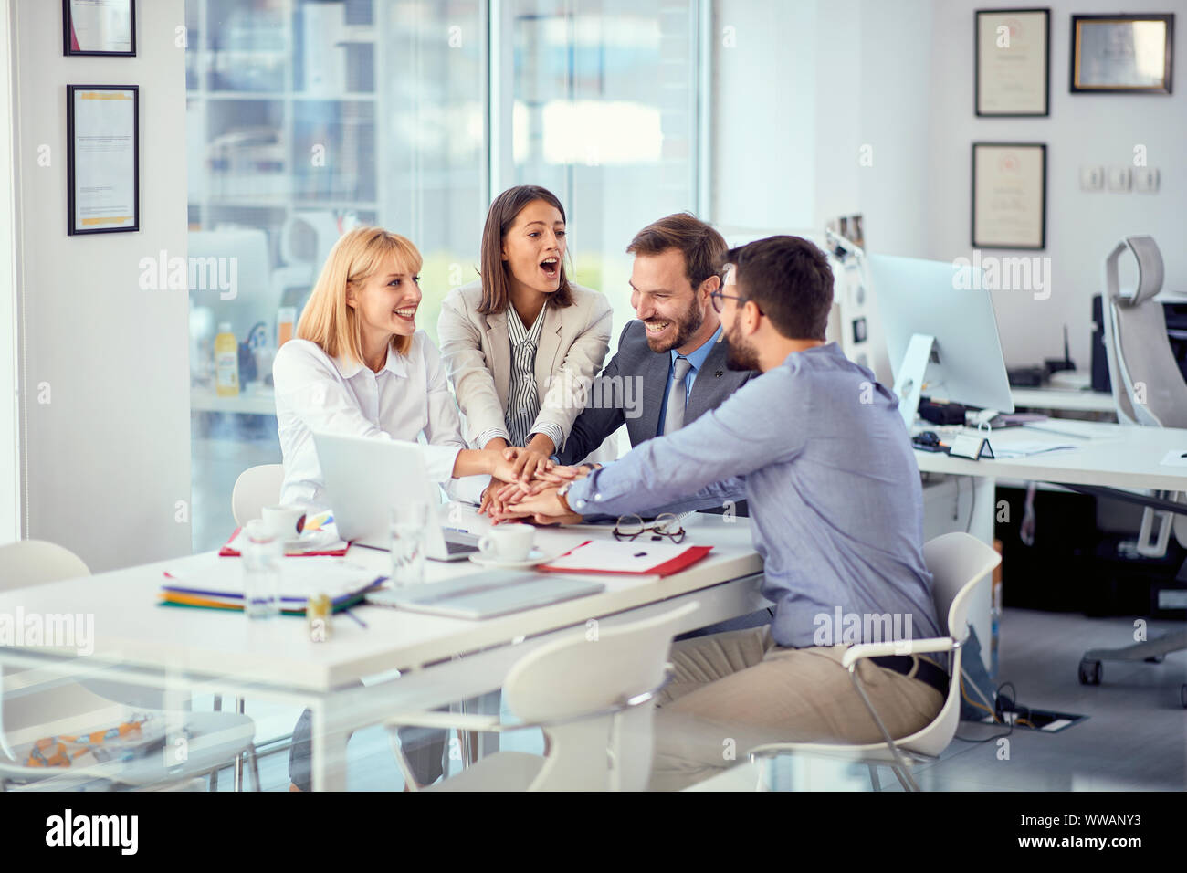 Young business people successfully completed business meeting with ...