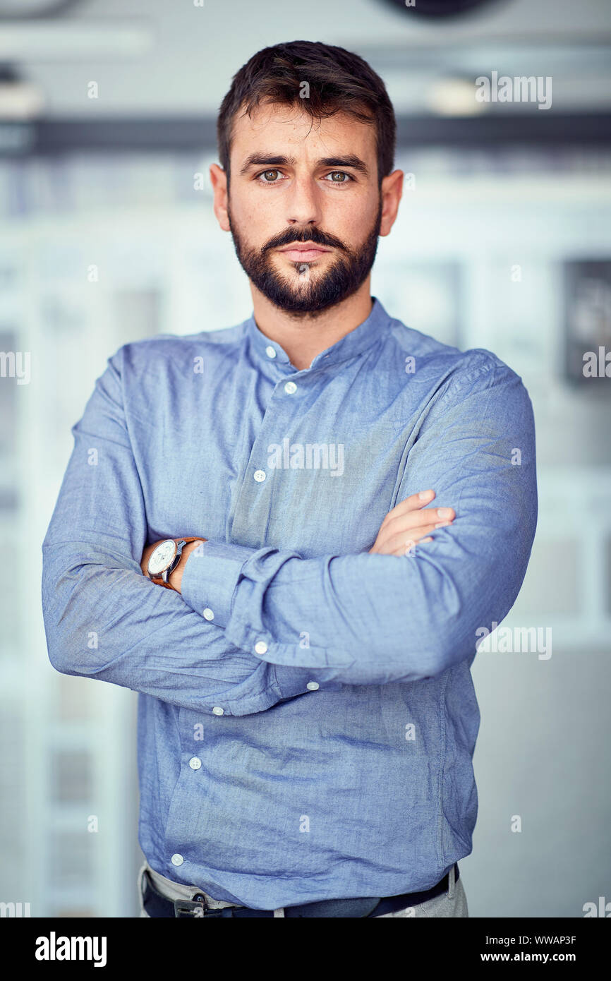 Portrait of successful employee at workplace Stock Photo - Alamy