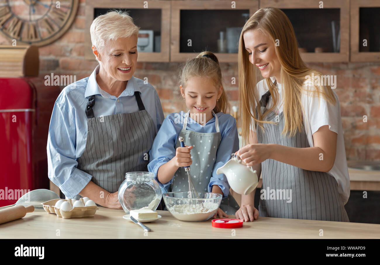 Young girl learning how to make pastry Stock Photo - Alamy