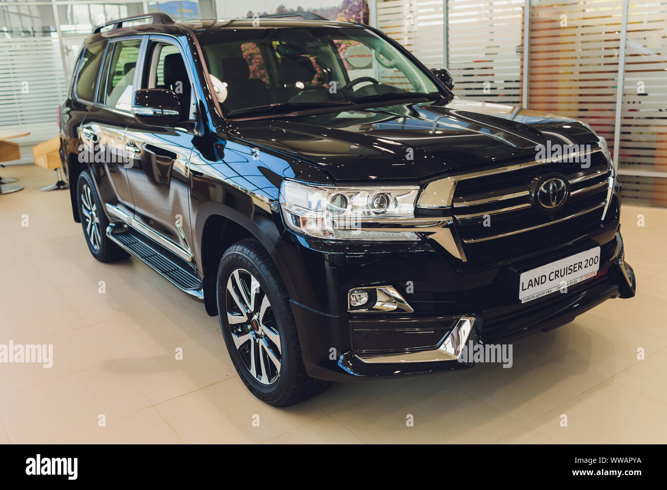 Ufa, Russia, 1 July, 2019: New cars in the Toyota showroom. Modern Land ...