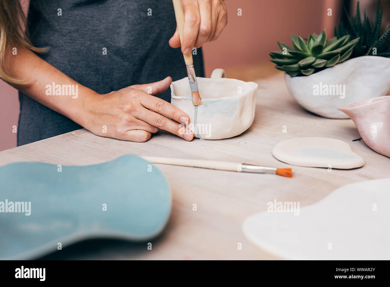 Woman hands on ceramic hi-res stock photography and images - Alamy