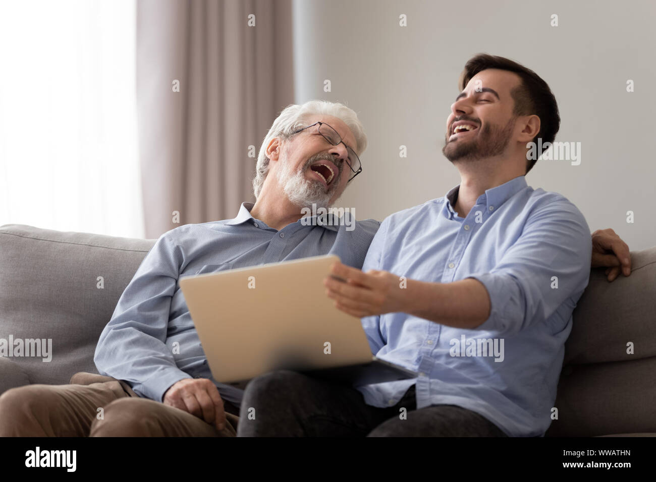 Old father with young son hi-res stock photography and images - Alamy