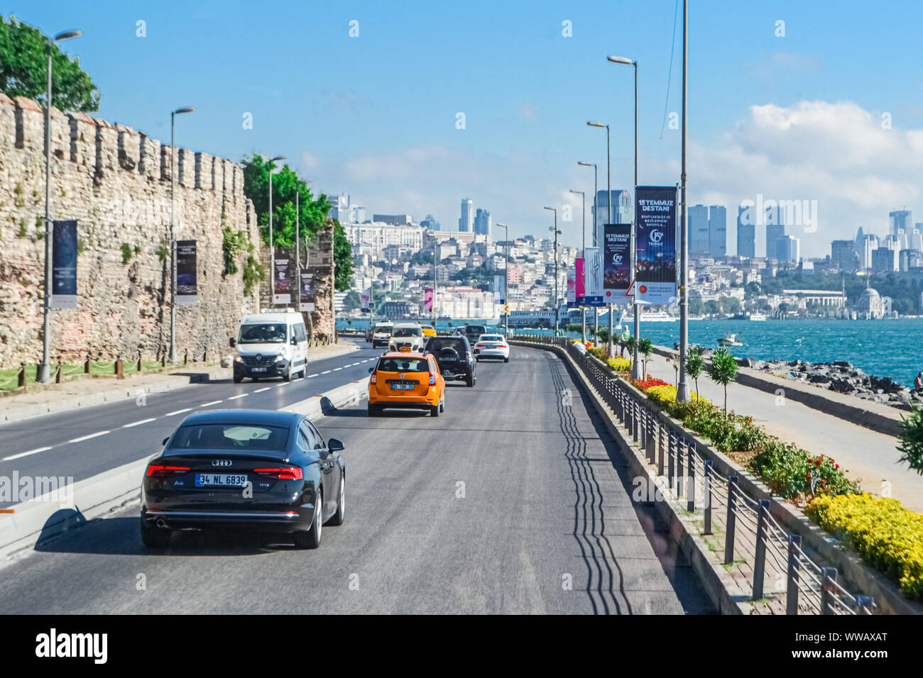Turkish car traffic in Istanbul. direction of travel yellow taxi ...