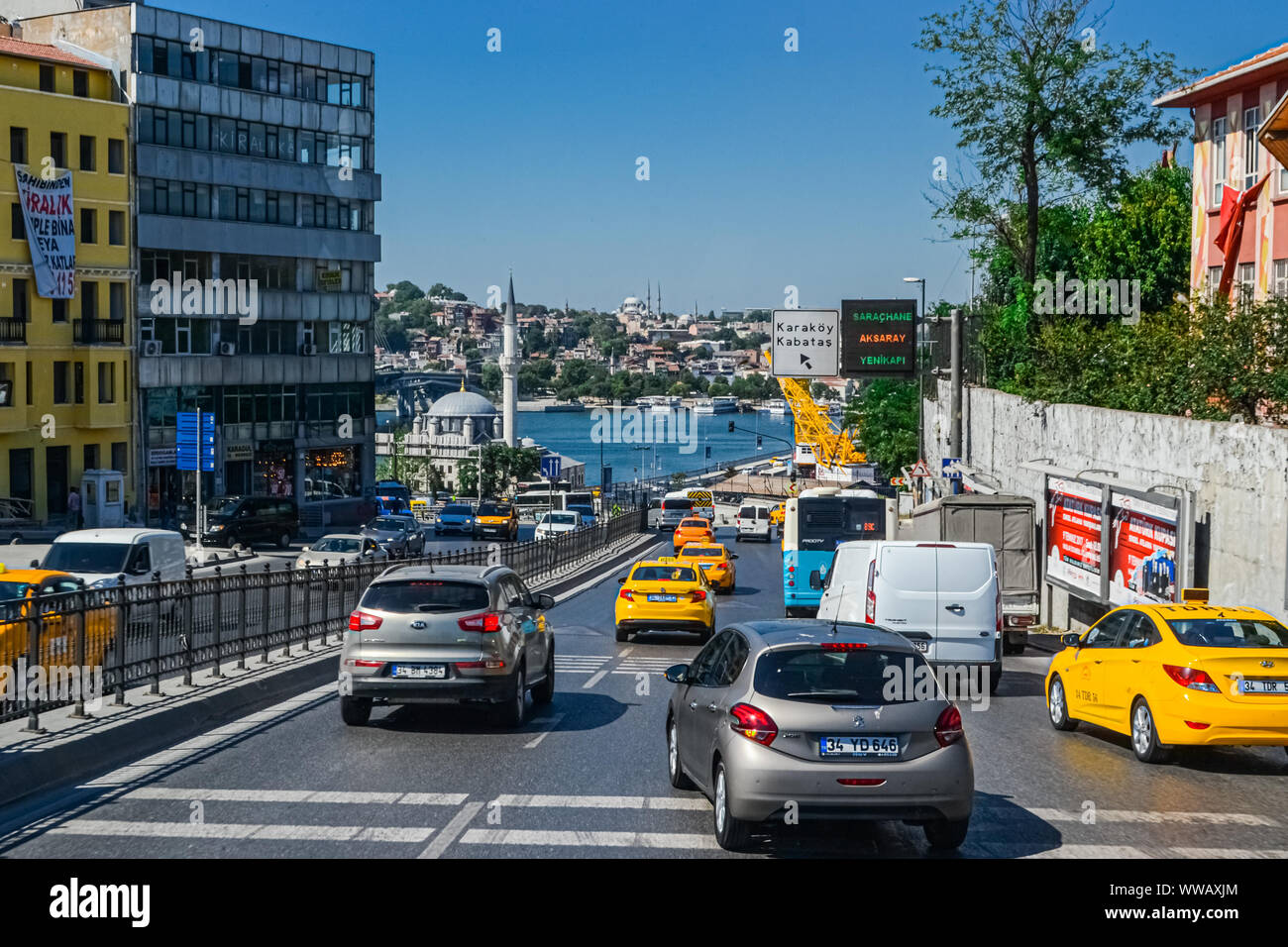 Turkish car traffic in Istanbul. direction of travel yellow taxi ...