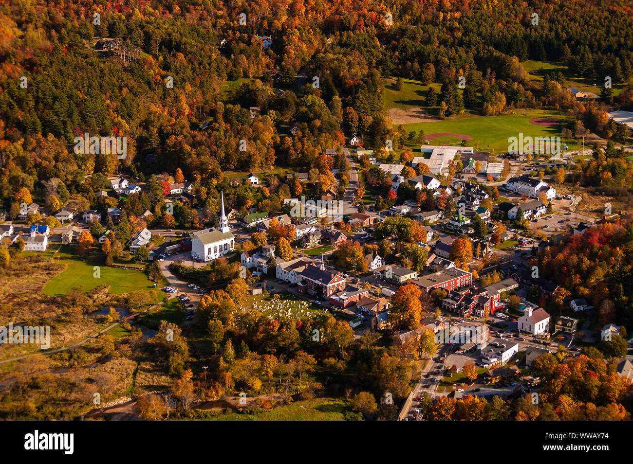 Aerial view of the town of Stowe Vermont on a colorful autumn afternoon ...