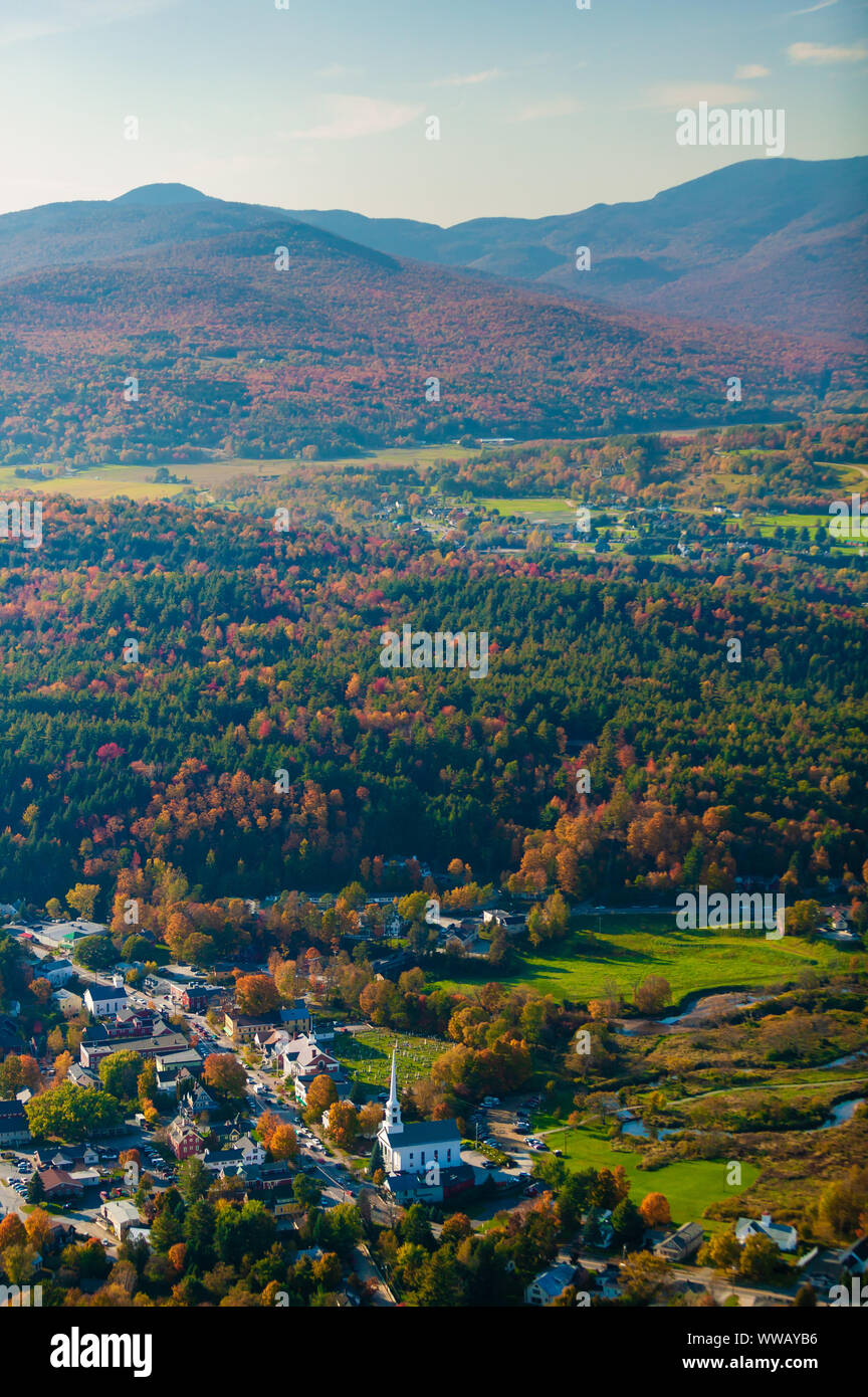 Aerial view of the town of Stowe Vermont on a colorful autumn afternoon ...