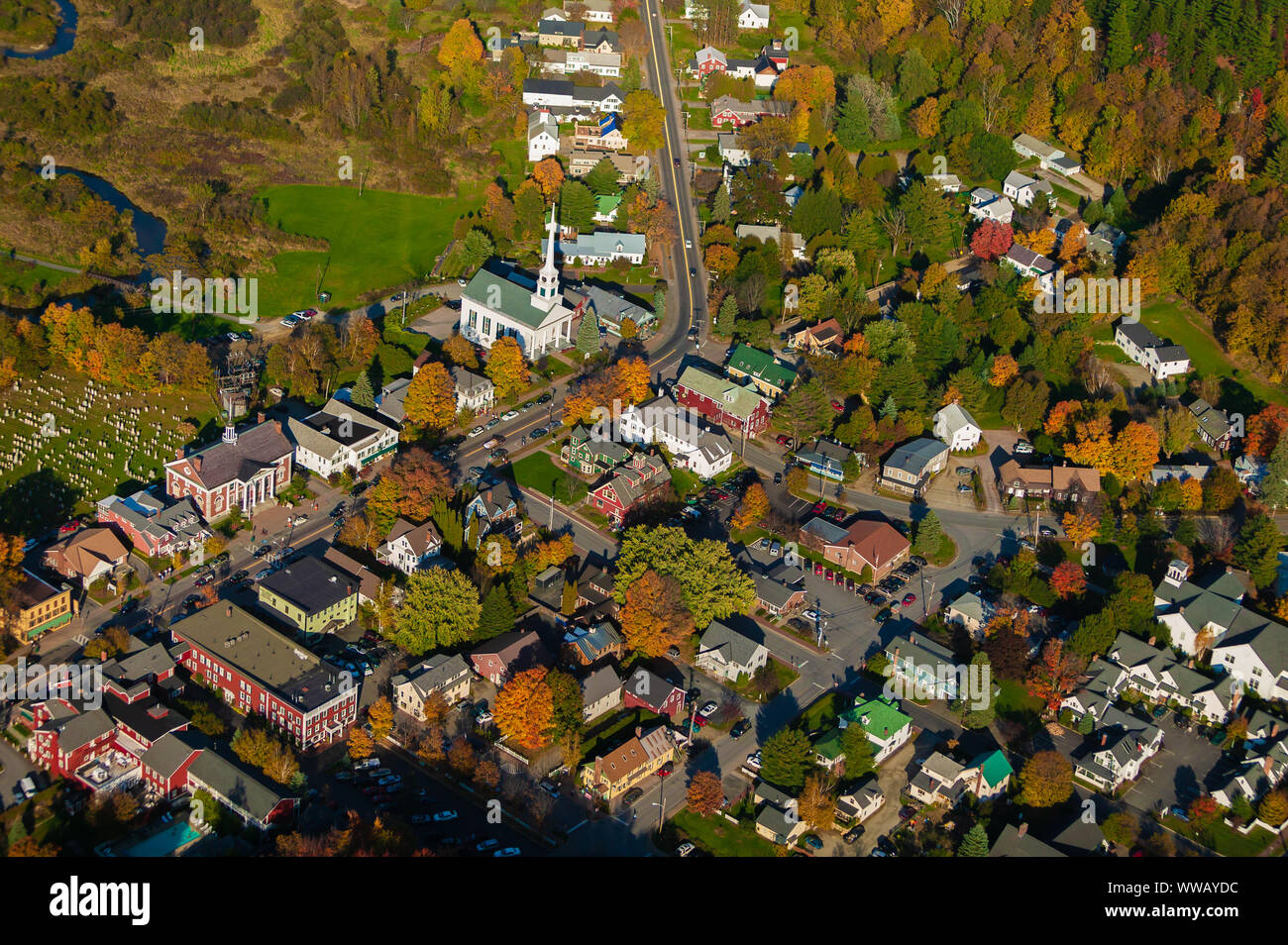 Aerial view of the town of Stowe Vermont on a colorful autumn afternoon ...