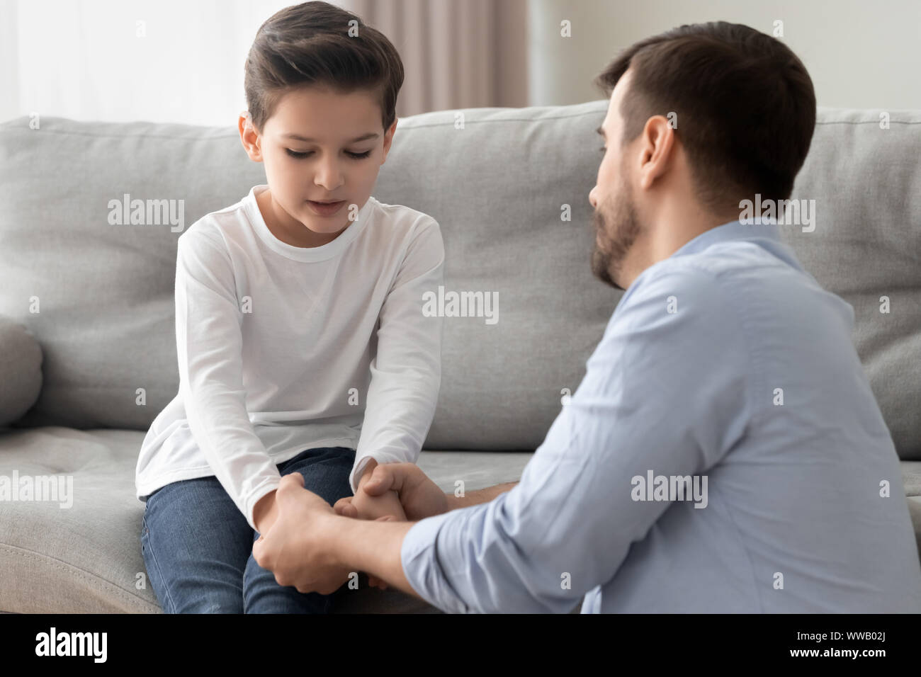 Child comforting friend hi-res stock photography and images - Alamy