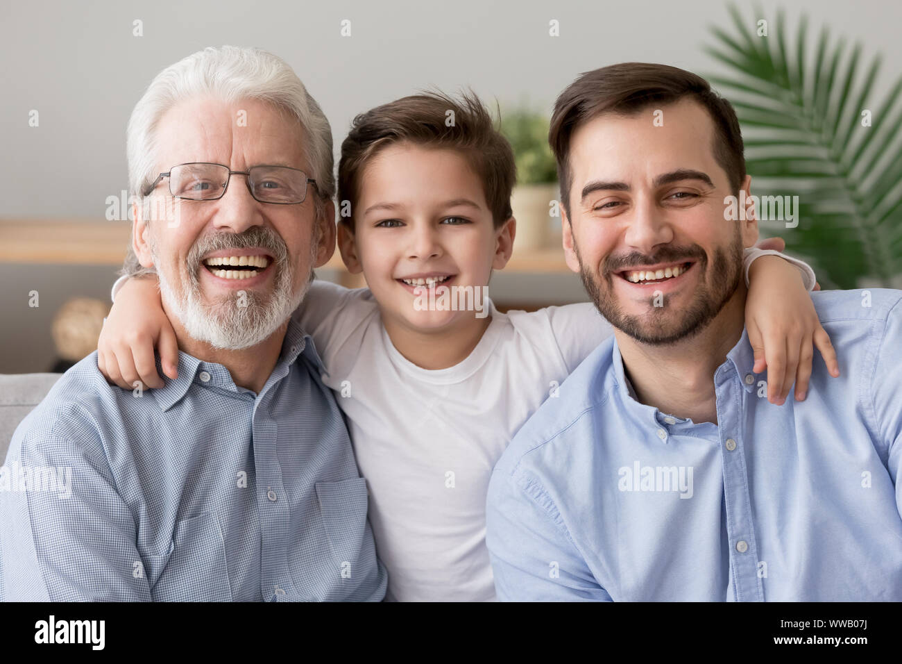 Happy male intergenerational 3 three generation men family portrait ...