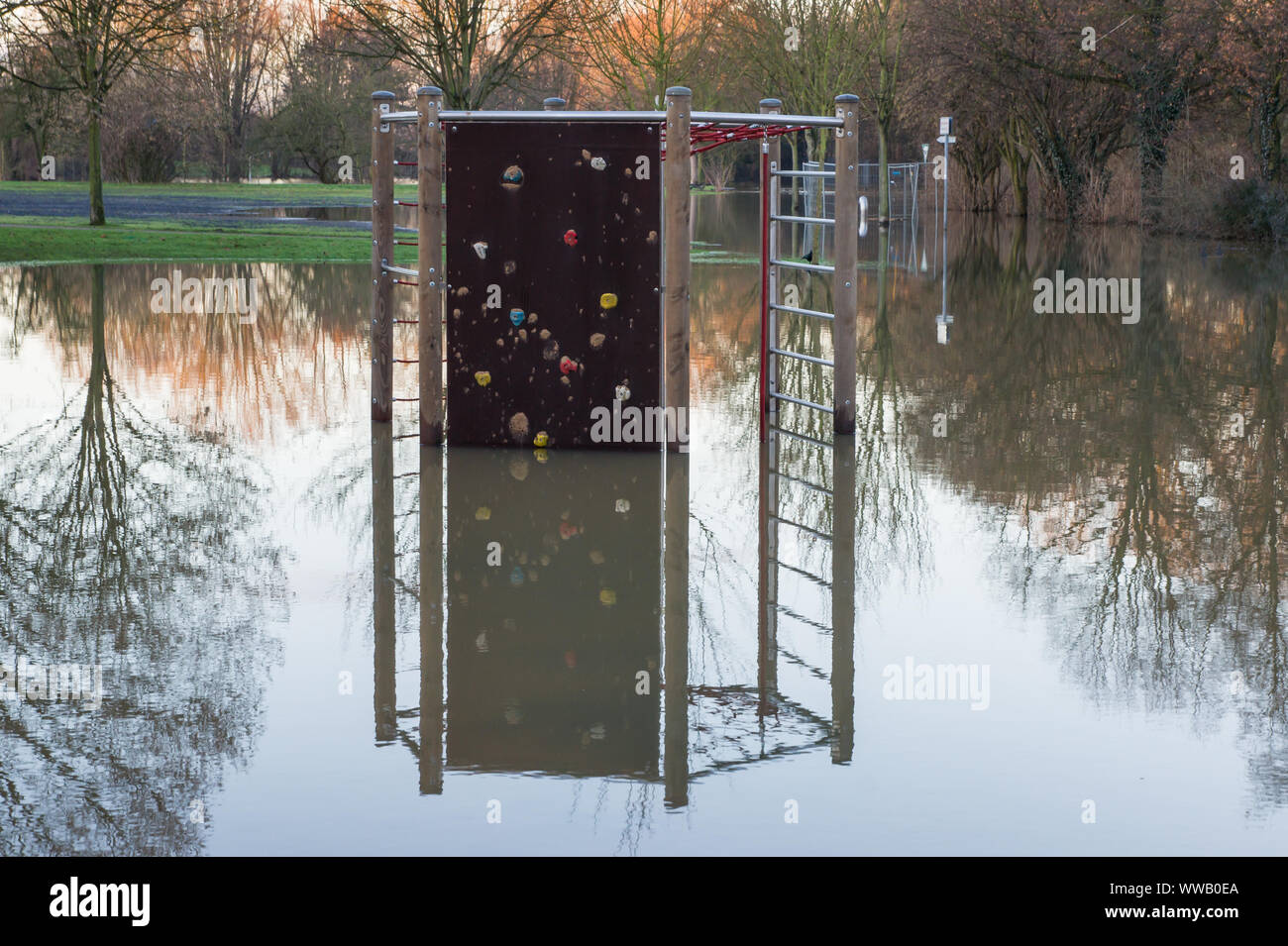 Climbing frame on a playground, surrounded by the floods of the Rhine ...