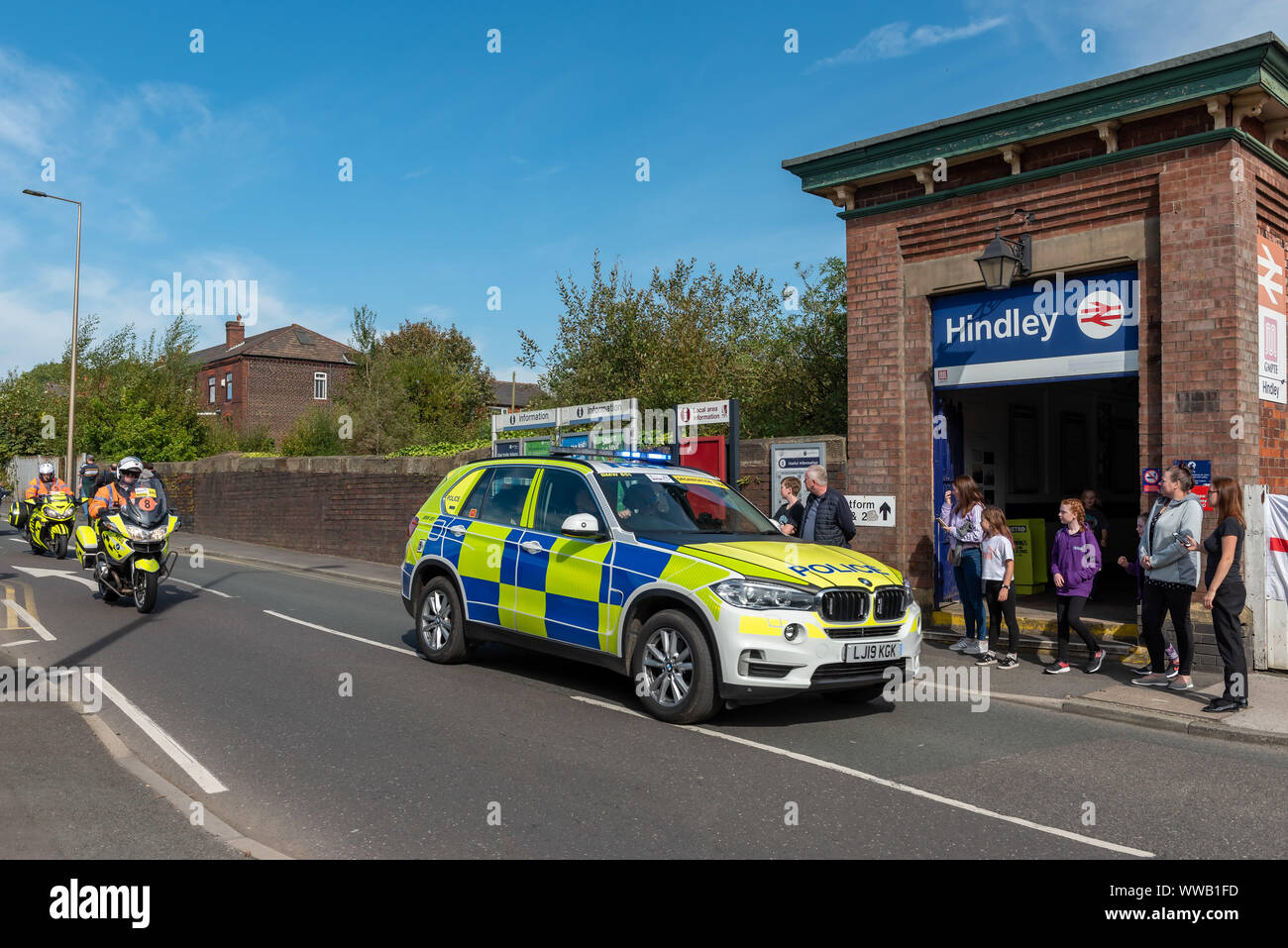 WIGAN, UK 14 SEPTEMBER 2019: A photograph documenting police advance ...