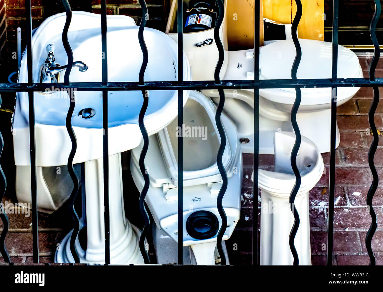 Washing behind bars Stock Photo - Alamy