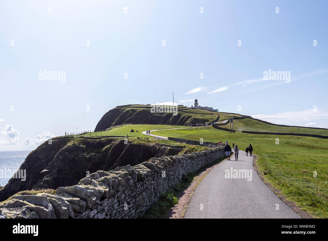 Tourist heading Sumburgh Head Lighthouse in RSPB Sumburgh Head ...