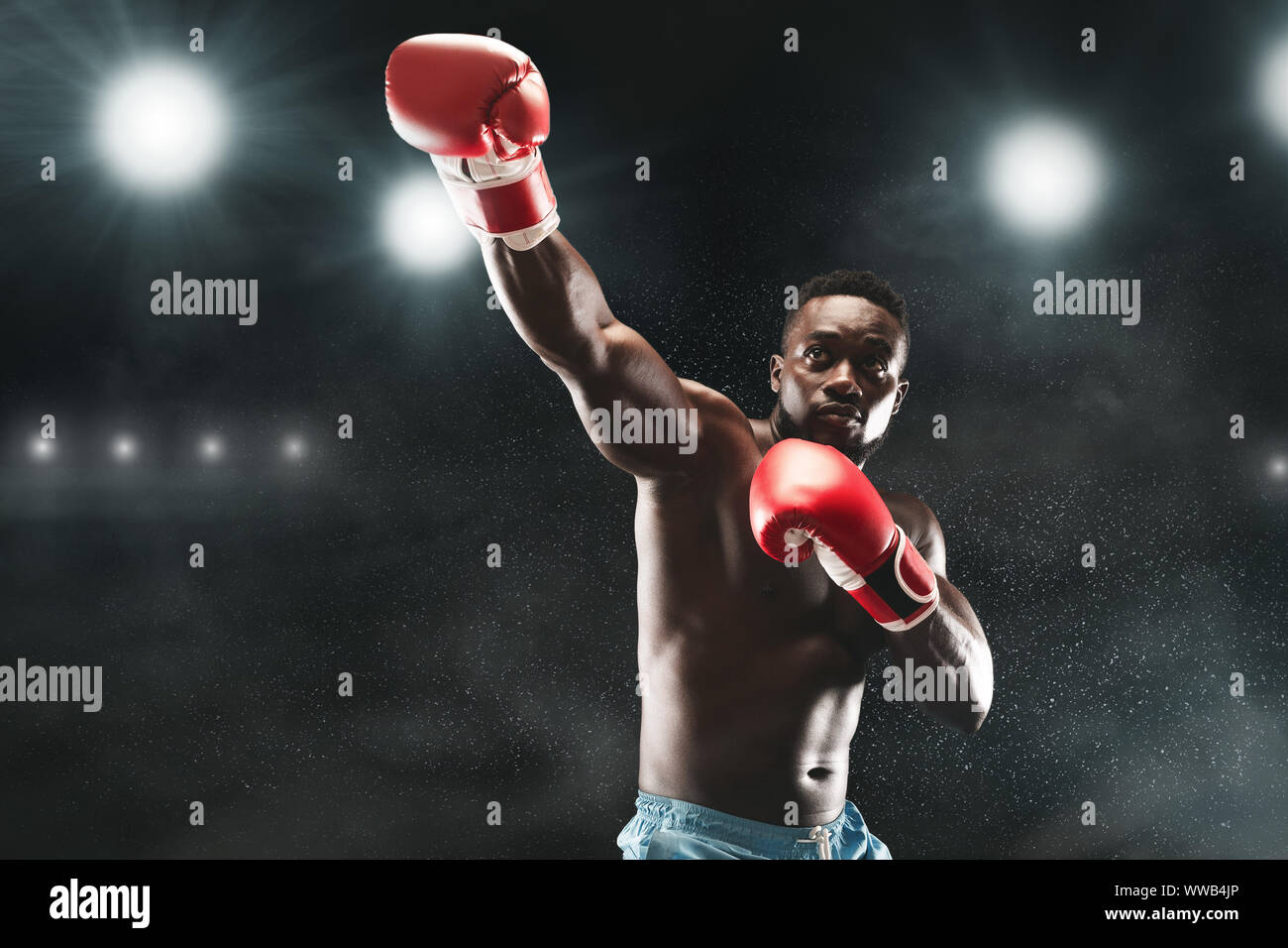 Picture of professional black mma boxer fighting on stadium arena Stock ...