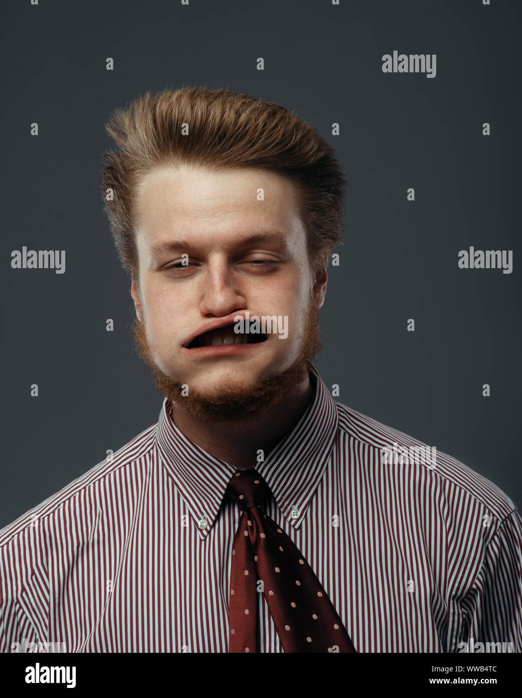 Strong wind blowing in male face, funny emotion Stock Photo - Alamy