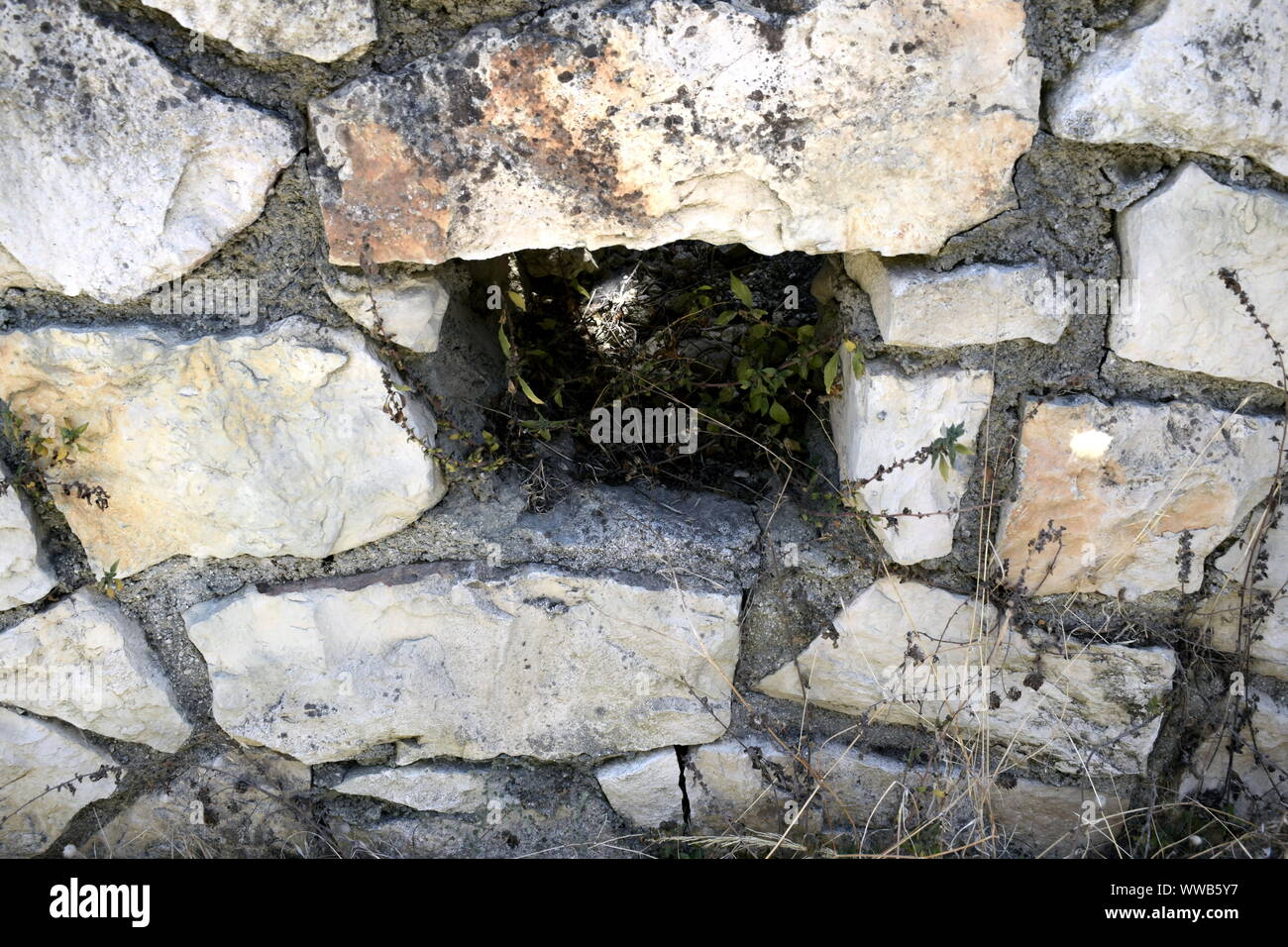 Hole stone wall hi-res stock photography and images - Alamy