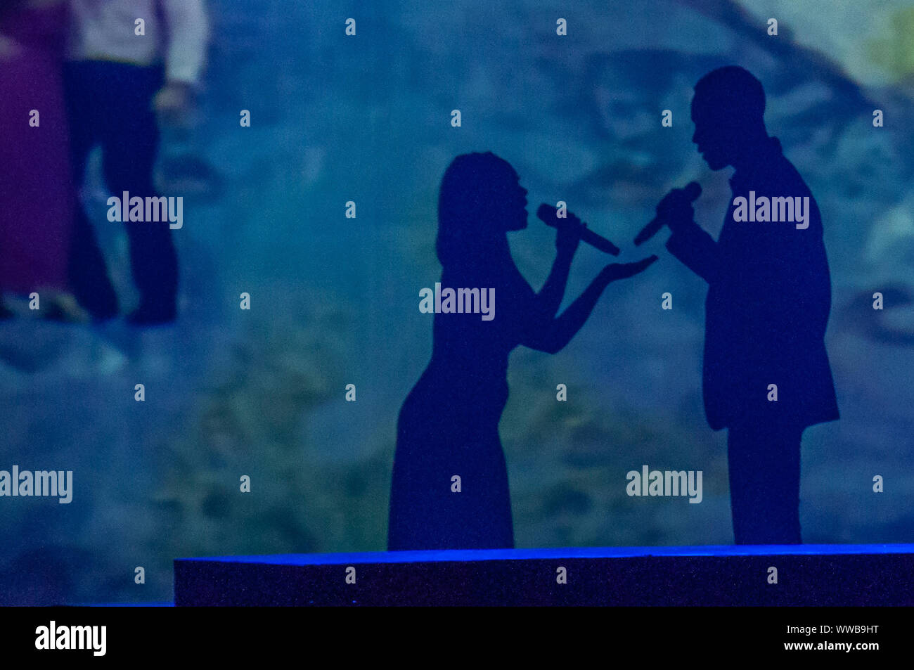 Female singer on stage silhouette hi-res stock photography and images ...