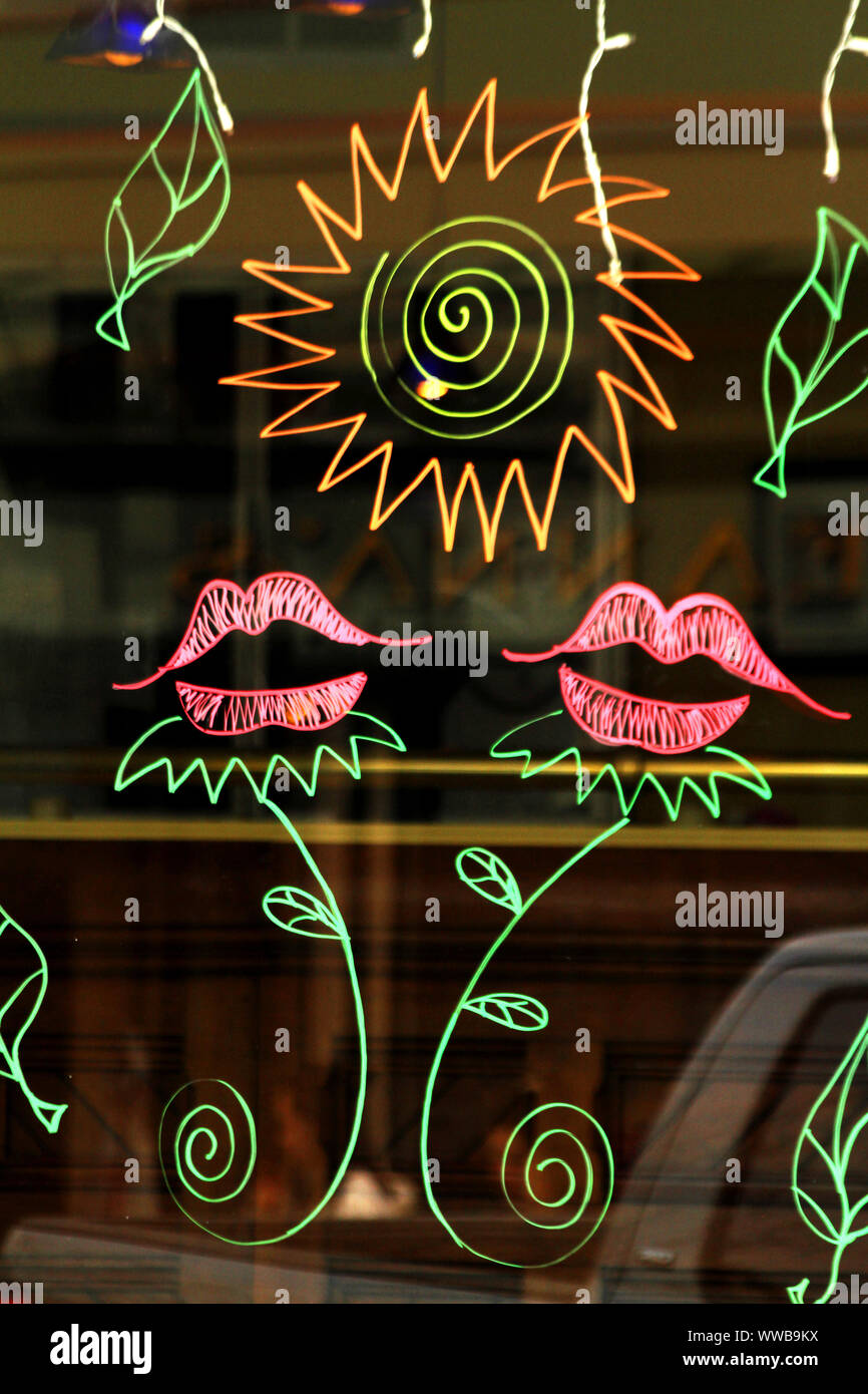 Art on store's window. Window markers. Fun art Stock Photo - Alamy