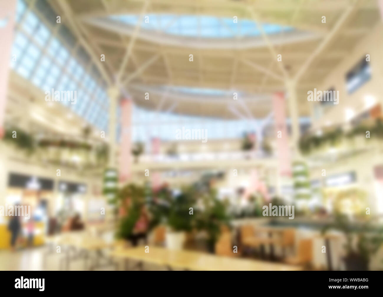 Blurred shopping mall white bright interior background. Defocused trade ...